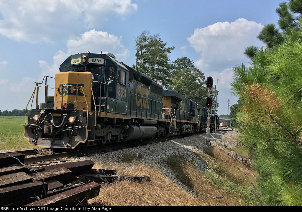 After uncoupling from their train at Fairburn, CSX SD40-2 8881 (CR 6991), 5485, 3407, 5324, and ...